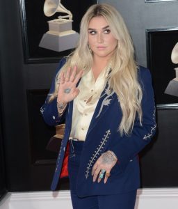 Kesha Rocks Gucci's Ace Patch Sneakers and Thiara Top-Handle Bag