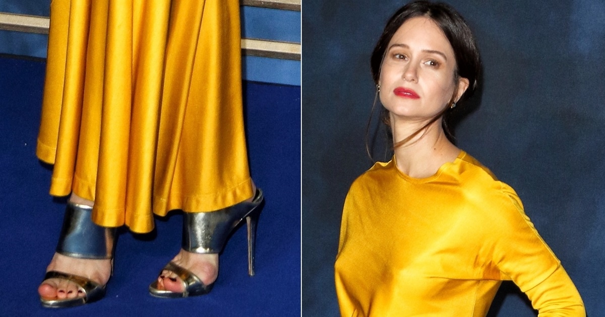 Katherine Waterstons Sexy Feet In Yellow Asymmetric Sleeve Dress