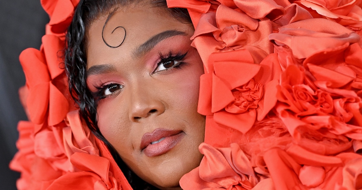 Lizzo Stuns in Explosive Floral Gown at 2023 Grammy Awards