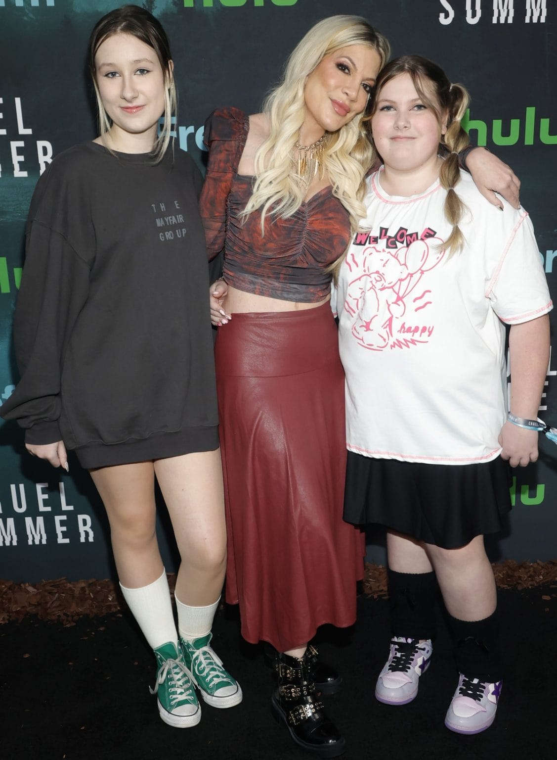 Tori Spelling Steps Out in Studded Combat Boots While Daughters Keep It ...