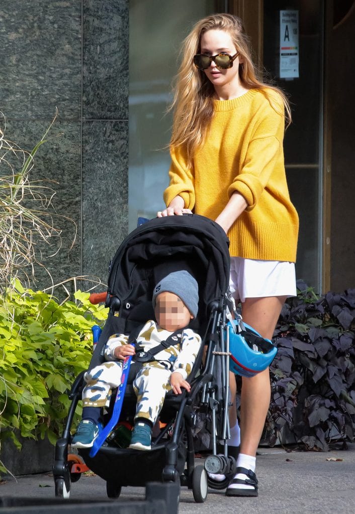 Jennifer Lawrence Embraces Mommy Duty in Yellow Sweater Before Dressing ...