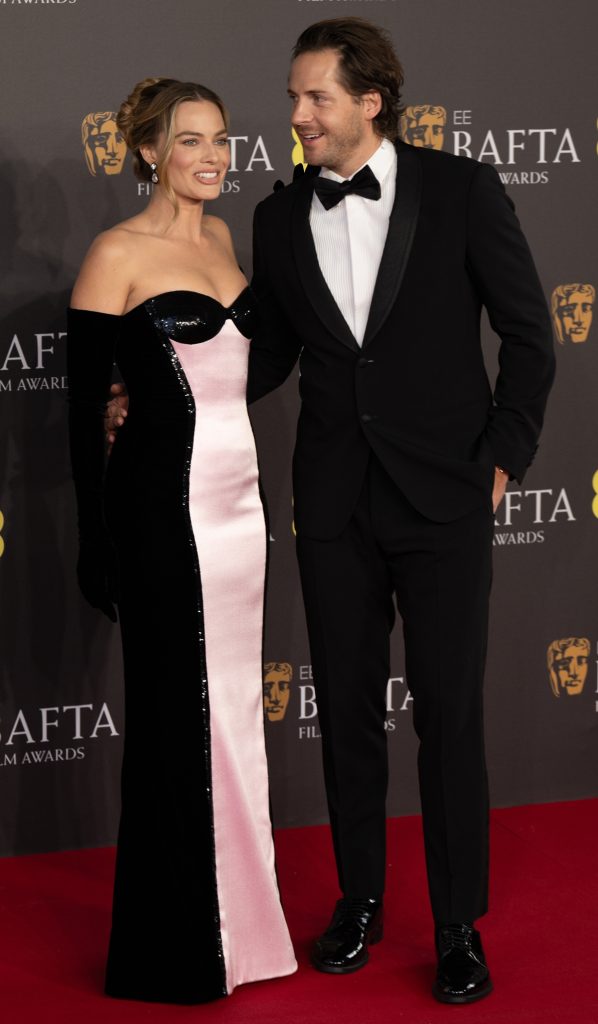 Barbie Glamour Reigns: Margot Robbie Radiates in Black and Pink Armani ...