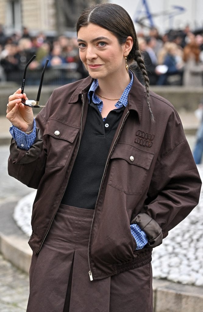 Lorde Exudes School Girl Vibes in Rare Public Appearance at Miu Miu Show During Paris Fashion Week