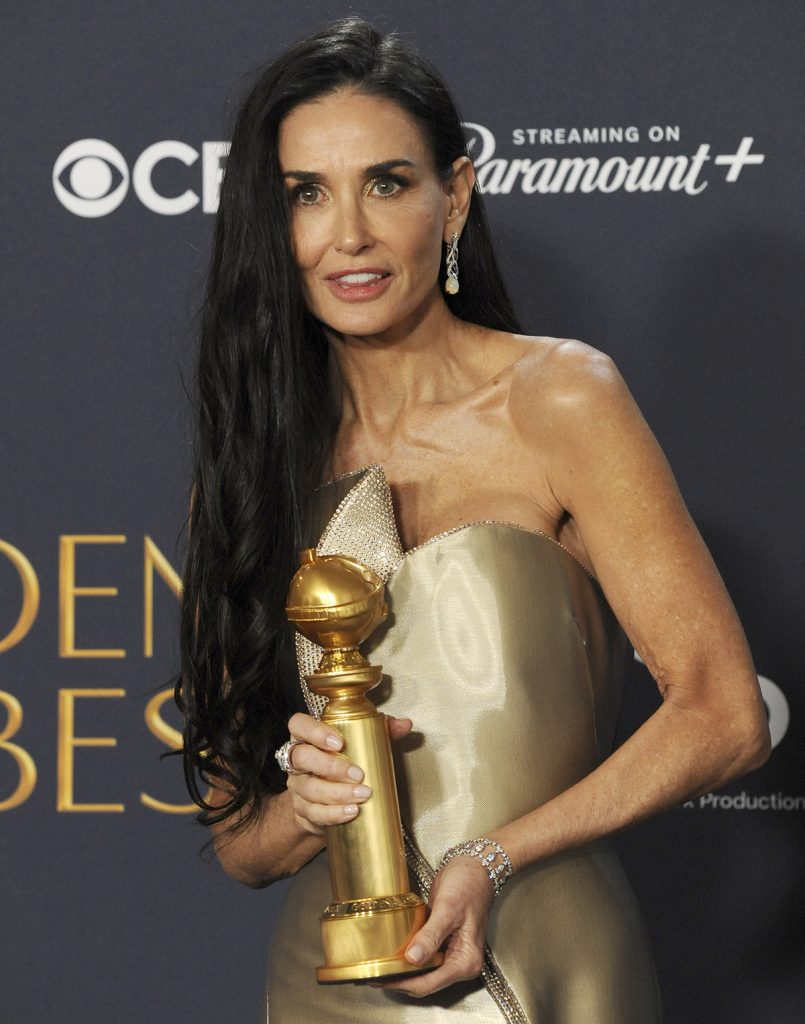 Demi Moore’s Golden Globes Triumph: Armani Gown & Louboutin Heels Stun ...